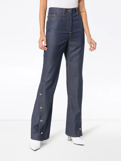 Shop Wright Le Chapelain button detail flared jeans with Express ...