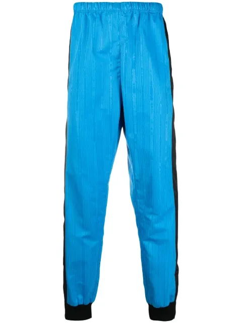 Marine Serre Tapered Pants for Men - Shop Now on FARFETCH
