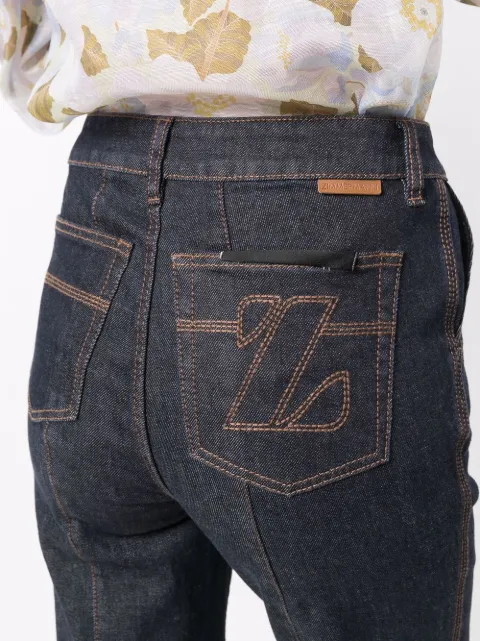 ZIMMERMANN contrast-stitch flared-leg Denim Jeans - Farfetch