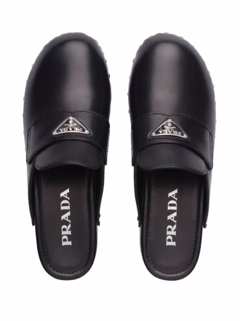 Prada triangle logo studded clogs - FARFETCH