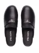 Prada triangle logo studded clogs - FARFETCH