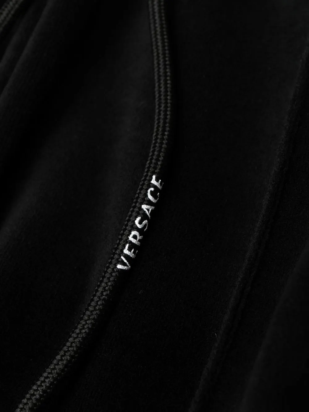 Versace logo-lettering Trousers - Farfetch