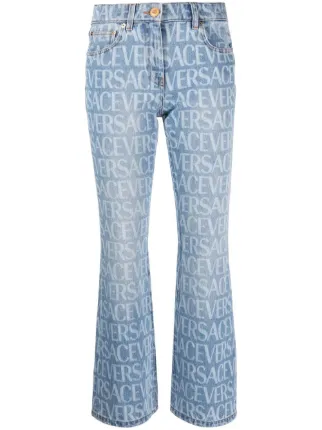 Versace mid-rise logo-print Bootcut Jeans | Blue | FARFETCH