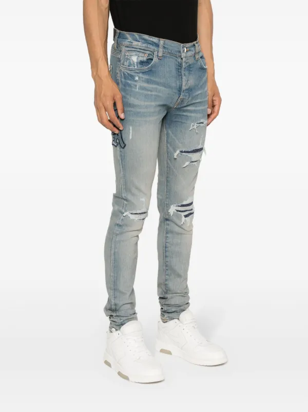 AMIRI Distressed Skinny Jeans | Blue | FARFETCH AMIRI Distressed Skinny Jeans | Blue | FARFETCH