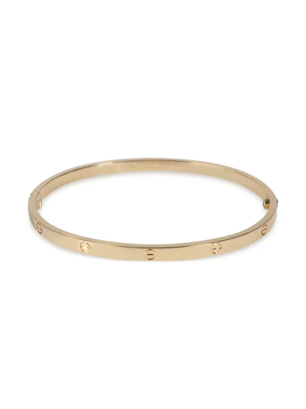 Pre owned cartier love bracelet yellow gold store