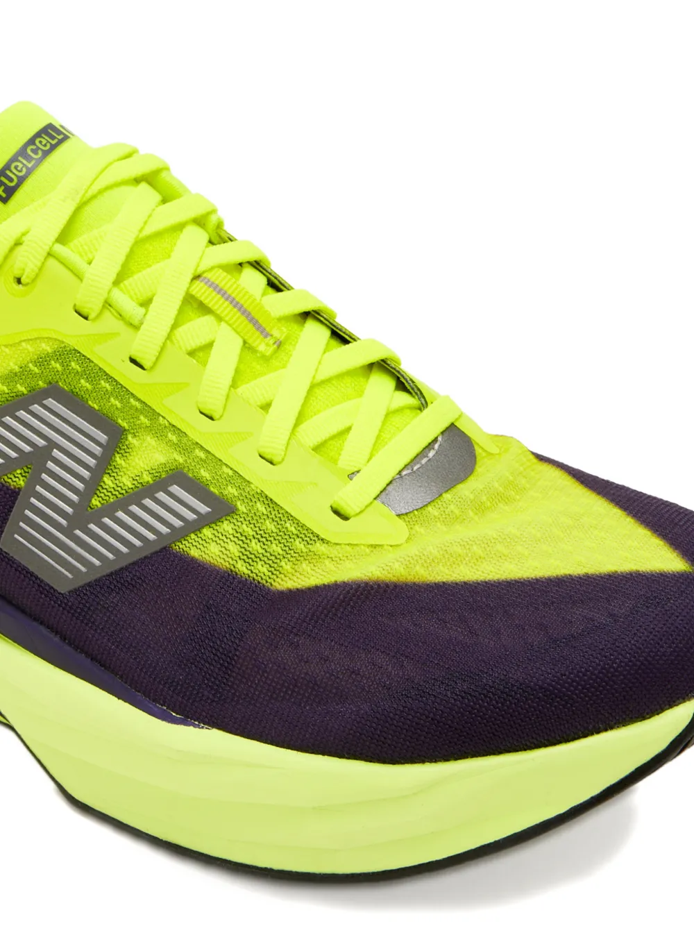 New Balance FuelCell Rebel v5 logo sneakers Groen - Schoenen.nl