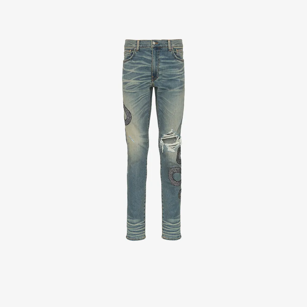 AMIRI snake embroidered distressed jeans | Browns
