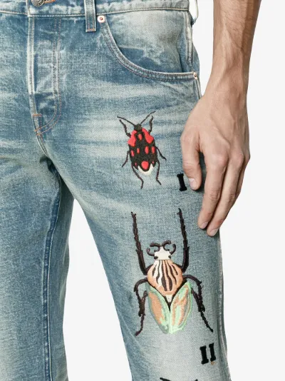Gucci tapered jeans with insect embroidery | Browns