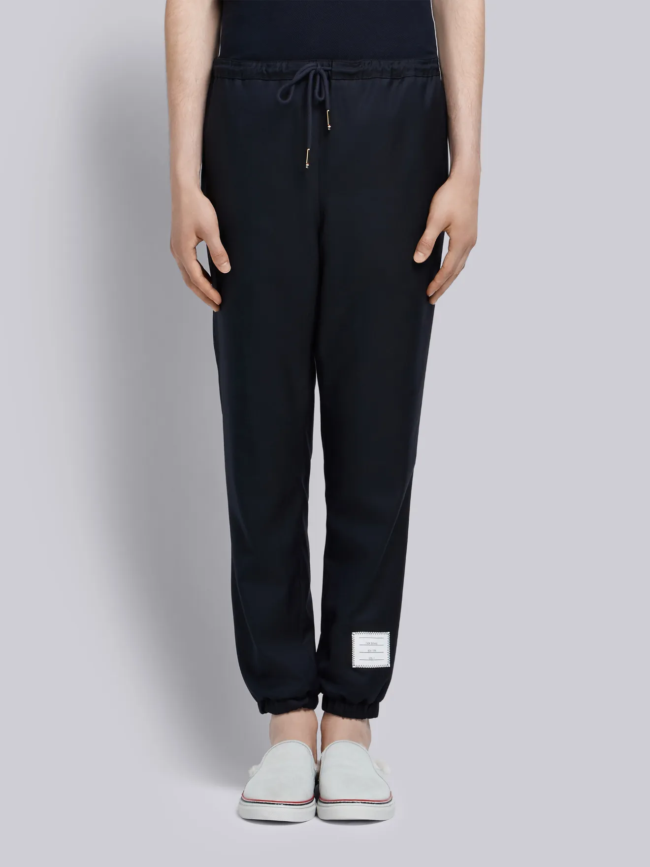 drawstring-waist wool track pants | Thom Browne